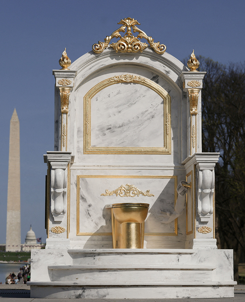 Large golden toilet, titled 'A Throne Fit for a King,' is displayed in ...